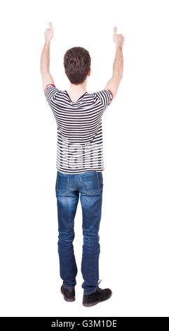 Young caucasian kid standing over blue background looking to the side ...