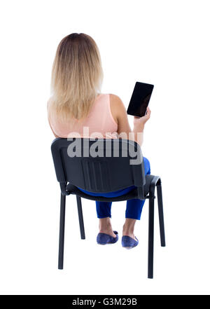 Blonde teenager woman holding vintage frame art very happy pointing ...