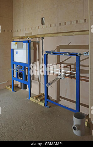 New house build using a steel frame. Plumbing connections for a shower ...