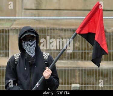 diagonally bisected red and black flag of anarchy Stock Photo - Alamy