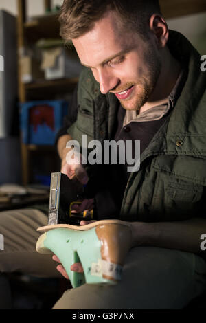 Close up of cobbler making shoes Stock Photo - Alamy