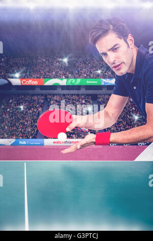 Young sportsman running while playing tennis on court Stock Photo - Alamy