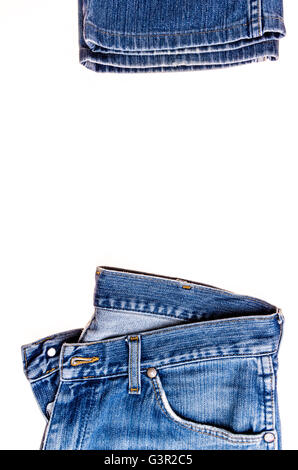 used blue jeans isolated on white background Stock Photo - Alamy