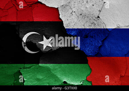 flags of Libya and Russia painted on cracked wall Stock Photo - Alamy