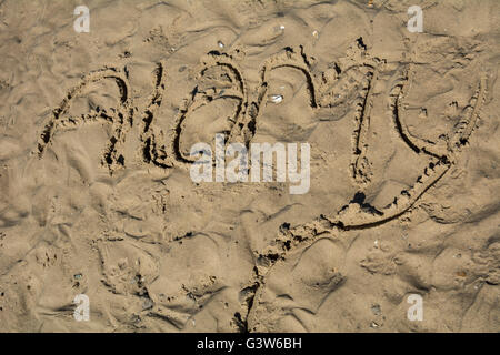 The word 'Alamy' drawn in the sand Stock Photo - Alamy