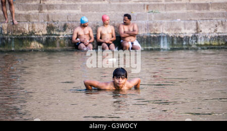 Indian Boy bathing in the Ganges River, Varanasi India Stock Photo ...
