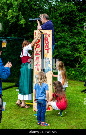 Children Playing The Traditional Game Of Splat The Rat At The Medieval ...