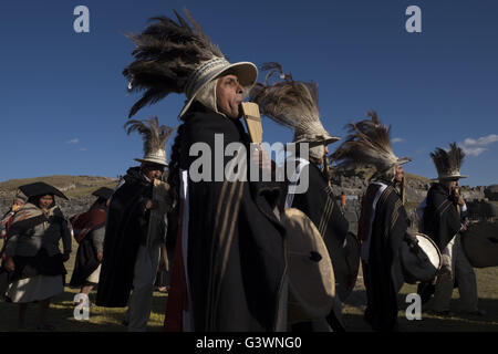 Inti Raymi, festival of the sun, musicians with siku, pan flute, ruins ...