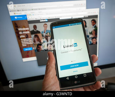 The LinkedIn social network for professionals app and logo is seen on ...