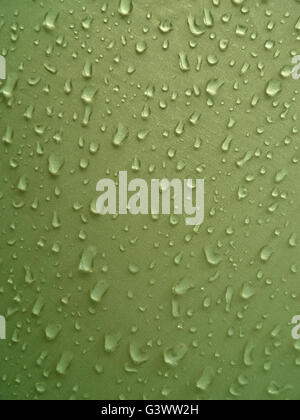 Raindrops on the green tent Stock Photo - Alamy
