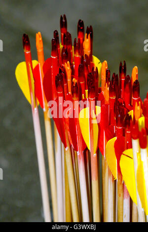 End of arrows with feathers background Stock Photo - Alamy