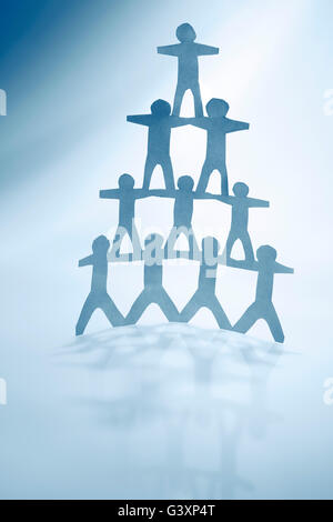 Human pyramid as a symbol Stock Photo - Alamy