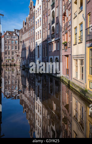 Corner building in Amsterdam (Netherlands) with traditional ancient ...