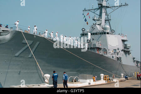 The guided-missile destroyer USS Ross docks at Naval Station Norfolk ...