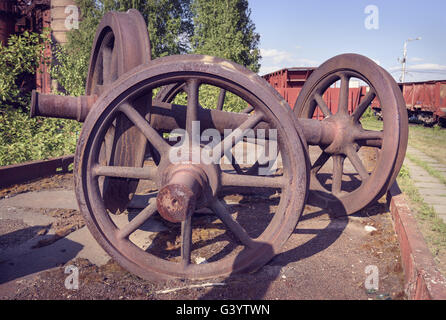 Steel wheelset of railway cars on rails Stock Photo - Alamy