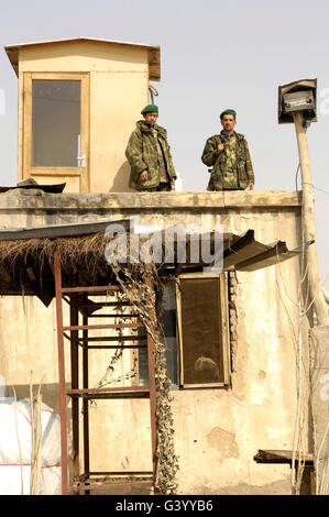 Two U.S. Army soldiers stand outside the U.S. Embassy following the ...