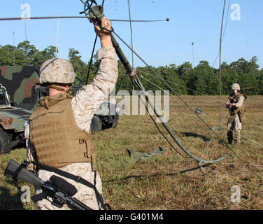 Communications Marine, soldier with communications radio during a beach ...