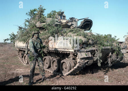 An M2 Bradley infantry fighting vehicle refuels in the field during ...