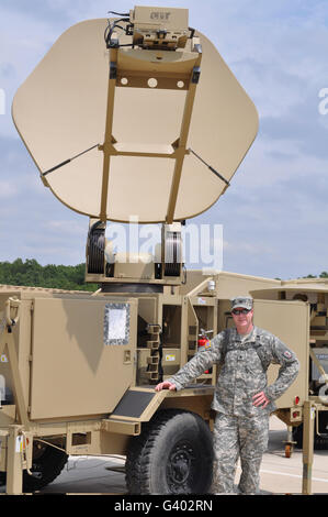 A U.S. Army satellite transportable terminal, towed by an M1165A1 multi ...