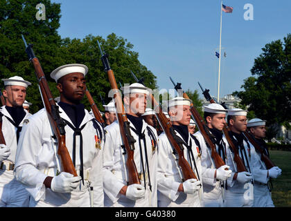 US Navy A U.S. Navy Ceremonial Guard renders honors during a full honors welcoming ceremony ...