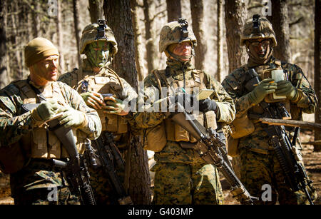 The U.S. Marine Corps Quantico Color Guard presents the colors during ...