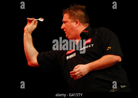 Colin Lloyd in action against Darin Young during the Ladbrokes.com ...