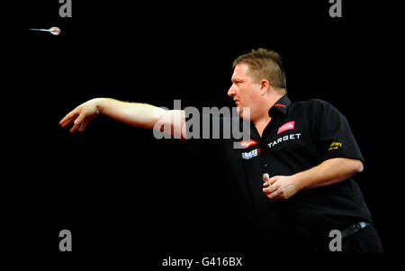 Colin Lloyd in action against Darin Young during the Ladbrokes.com ...