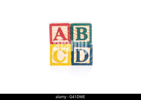 Wooden Alphabet Blocks ABCD isolated on white background with copy ...