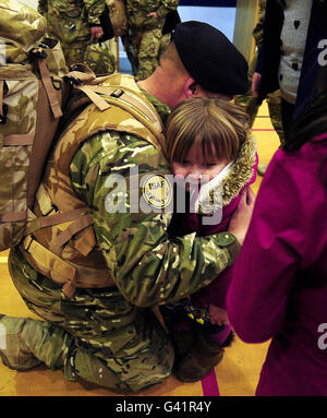 Servicemen of 2 Signal Regiment return to their base at Imphal Barracks ...