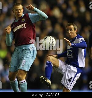 Birmingham City's Jonathan Spector and West Ham United's Carlton Cole ...