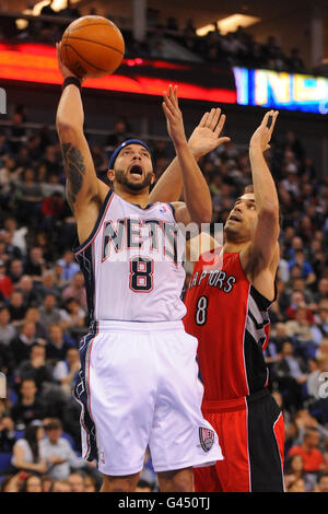 New Jersey Nets' Deron Williams is congratulated by teammate Sasha ...