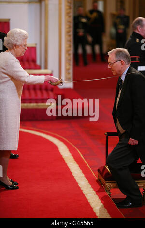 Sir Peter Bottomley is awarded his Knight Bachelor medal by Britain's ...