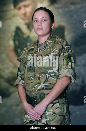 Corporal Isobel Henderson of the Royal Army Medical Corps proudly holds ...
