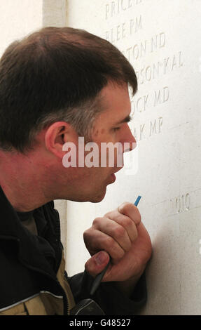 Nick Hindle prepares to engrave the names of UK Servicemen and women ...