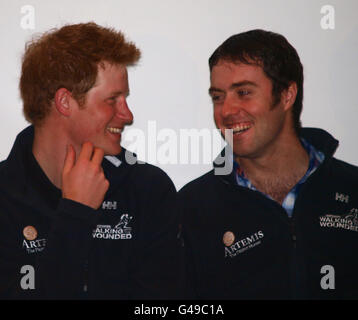 Prince Harry (left) with Captain Martin Hewitt at a reception for the ...
