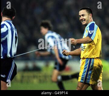 Chelsea captain Dennis Wise on the ground after Manchester United's ...