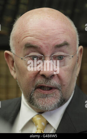 Education Minister Ruairi Quinn speaks to the media as he arrives for ...
