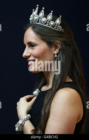 A Christie's employee wearing a Rosebery pearl & diamond tiara, which ...