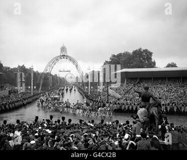 General view of the State Procession down the Nave led by H. M. The ...
