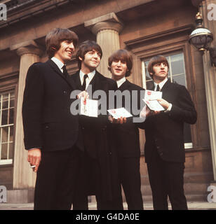 The Beatles with their MBE's Stock Photo - Alamy
