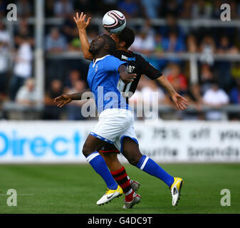 Hereford United's Kenny Lunt and Birmingham City's Adam Rooney (left ...