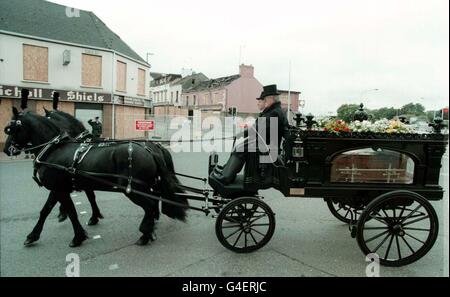 The coffin of Sean McGrath, the 29th victim of the Omagh bomb leaves St ...