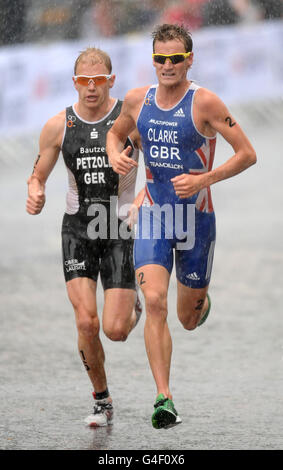 Great Britain's William Clarke (right) and Germany's Maik Petzold ...