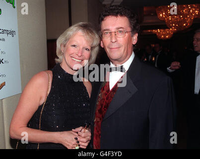 Actor Robert Powell with his wife Pans People dancer Babs Lord arriving ...