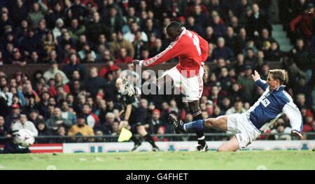 Manchester United's Dwight Yorke beats Barnsley's defence during the ...