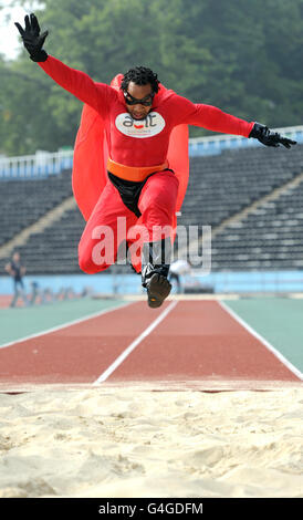 Wendell K Raphael dressed as mascot Super Donor Dan (right) beats Nick ...