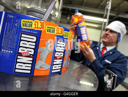 Mark Jephcott views bottles of Irn Bru in the production hall at AG Barr's Irn Bru factory in ...