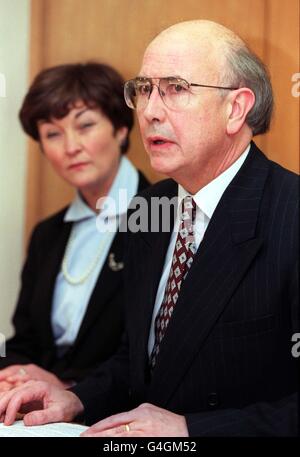 Dr Martin Neary and his wife, Penelope, speak to the media in London ...