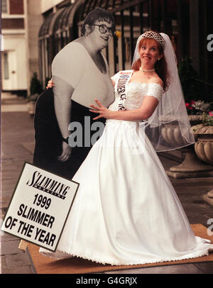 Slimmer of the Year Nicky Peirce, from Croydon, is lifted up by her ...