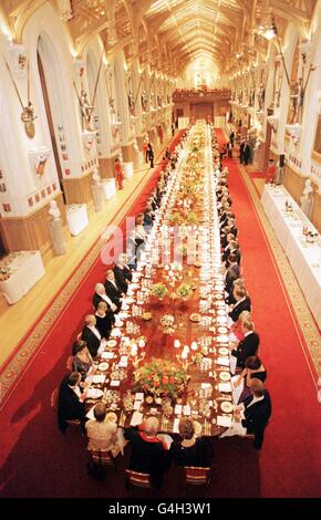 The Queen and Guests are seated in St Georges' Hall at Windsor Castle ...